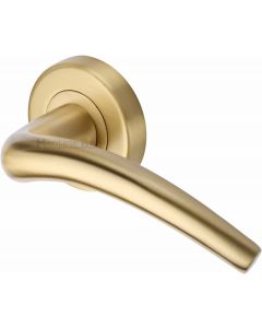 Satin Brass Lever Handles On Rose | G Johns & Sons